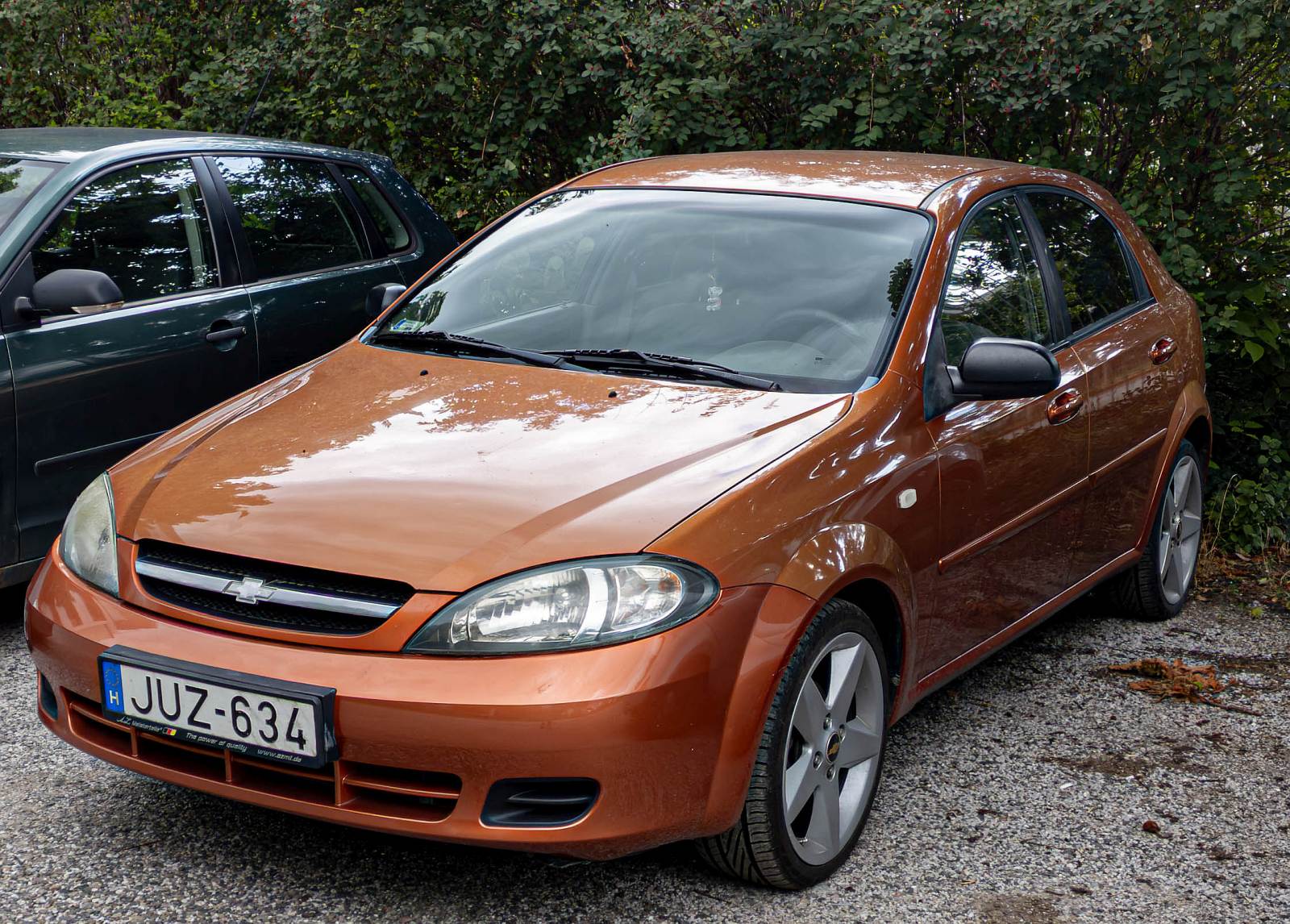 Rückansicht / Seitenansicht: Chevrolet Lacetti Sedan - Fahrzeugbilder.de