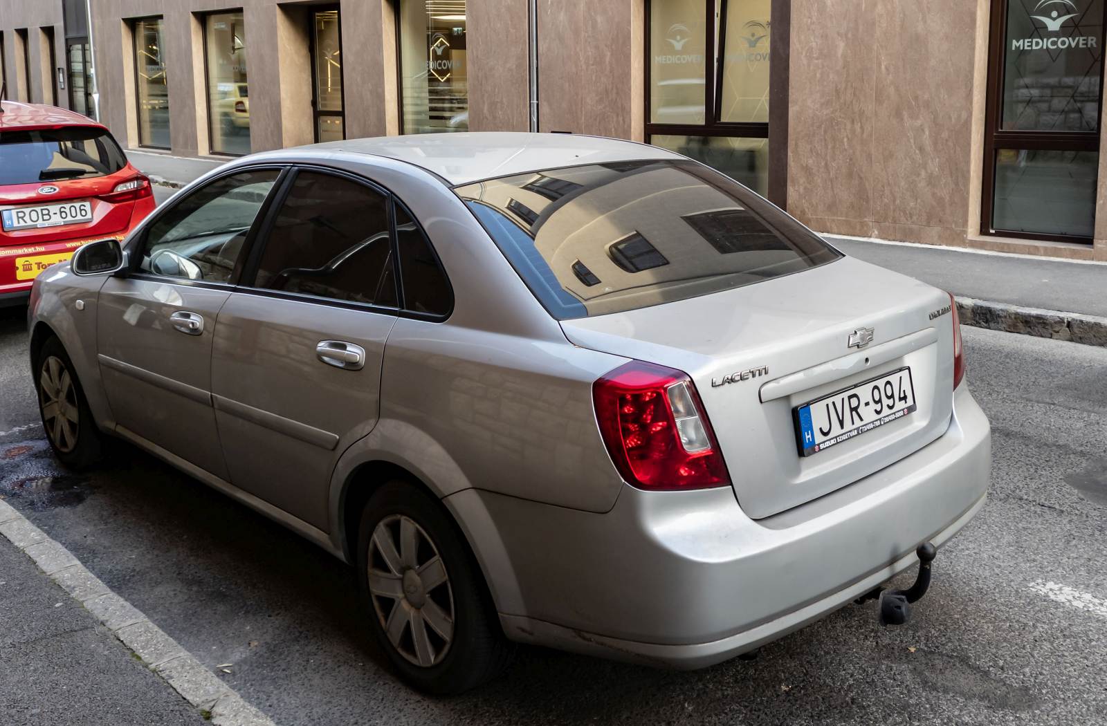 Rückansicht / Seitenansicht: Chevrolet Lacetti Hatchback - Fahrzeugbilder.de